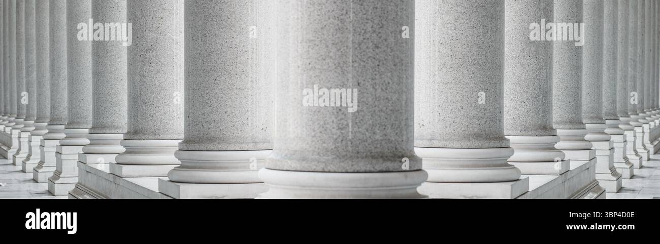 Symmetrical perspective of classical marble columns in a neoclassical ...
