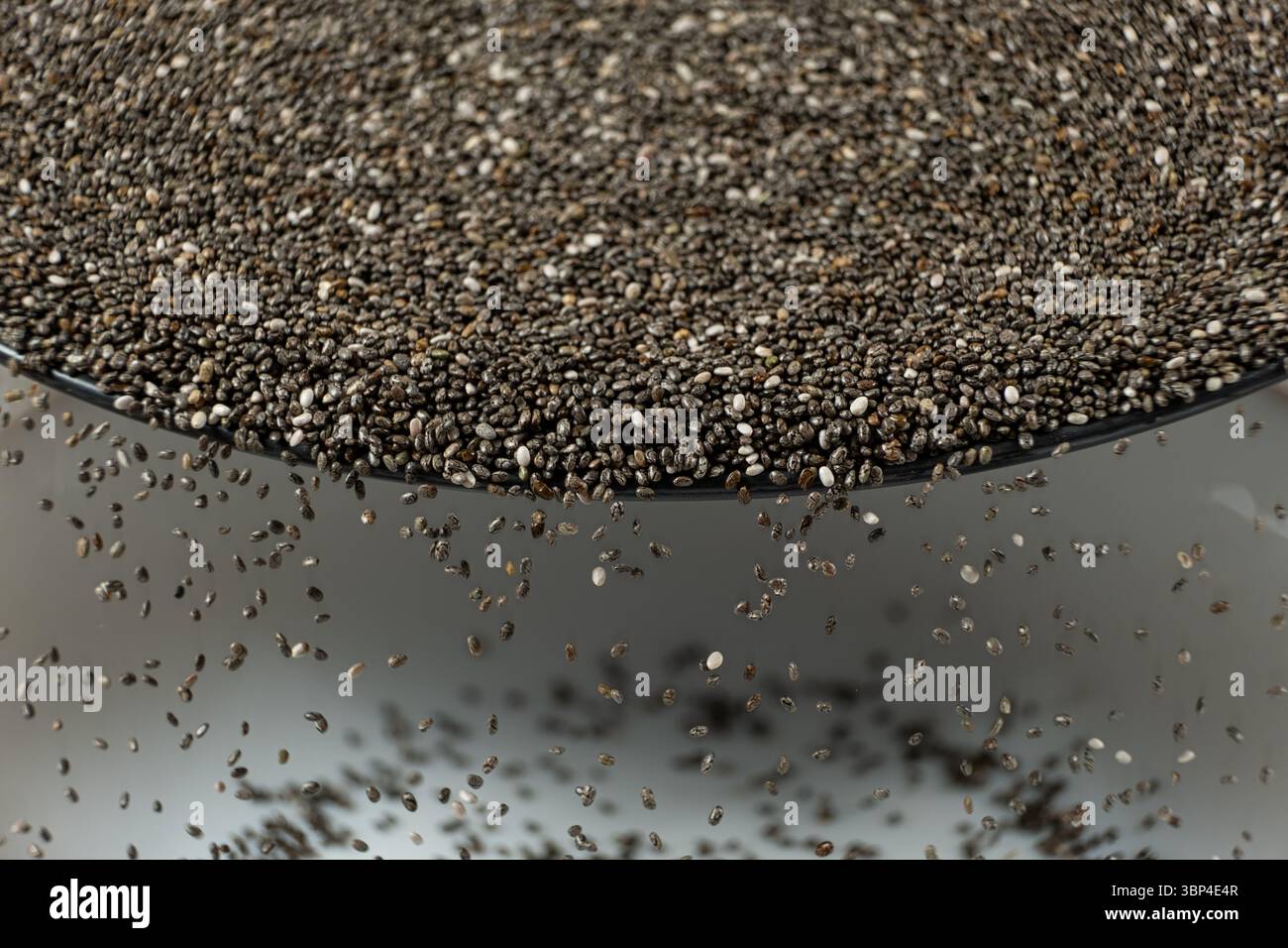 Lots raw uncooked chia seeds hi-res stock photography and images - Alamy