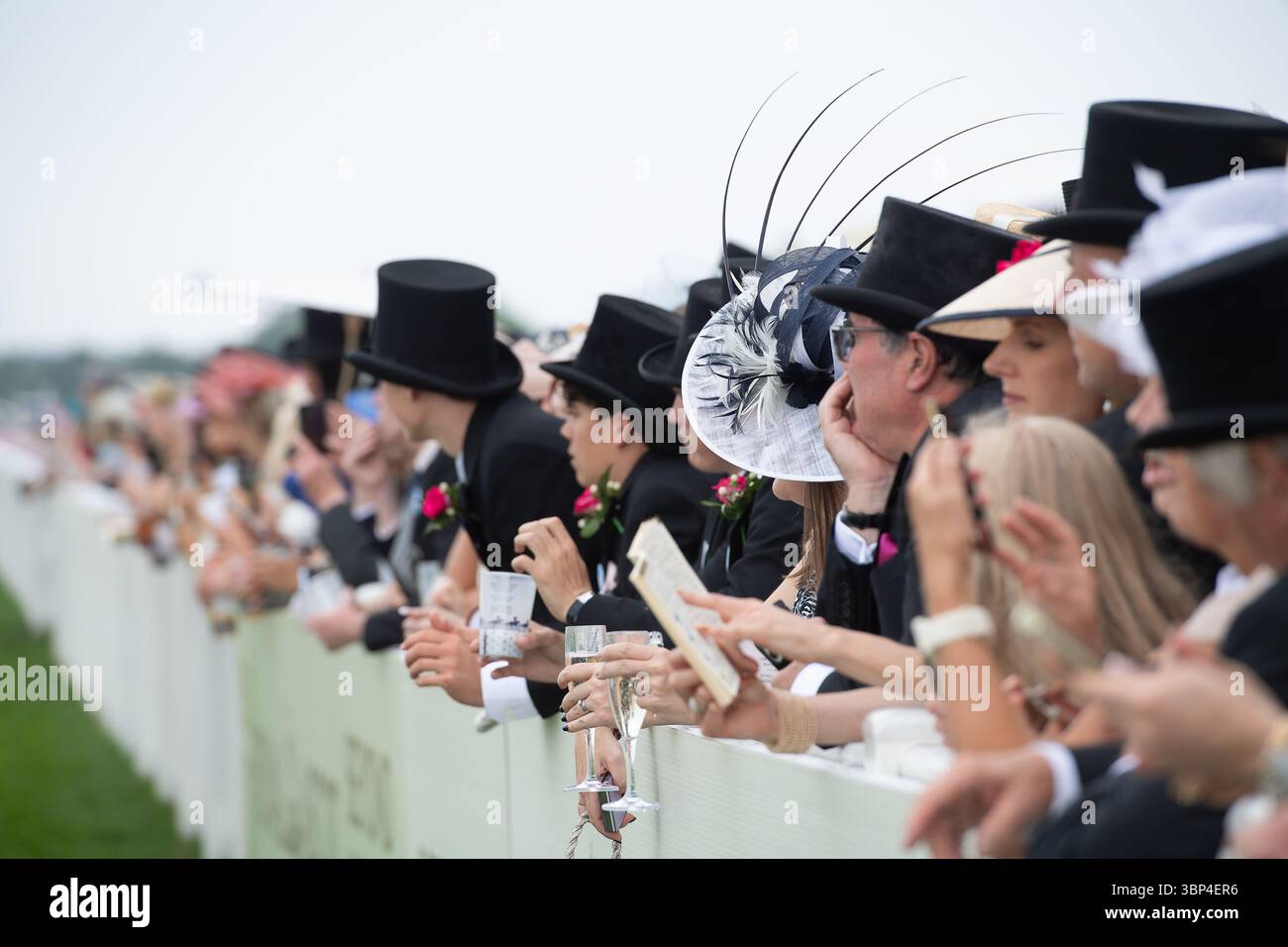 Ascot, Berkshire, UK. 21st June, 2025. Racegoers in the Royal Enclosure ...