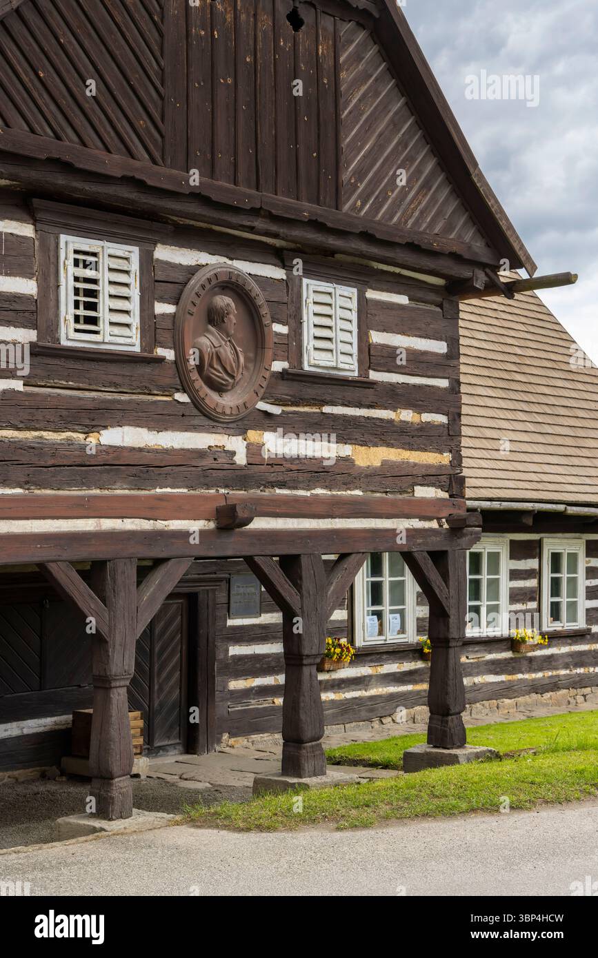 Traditional czech timbered house with white shutters and wooden ...