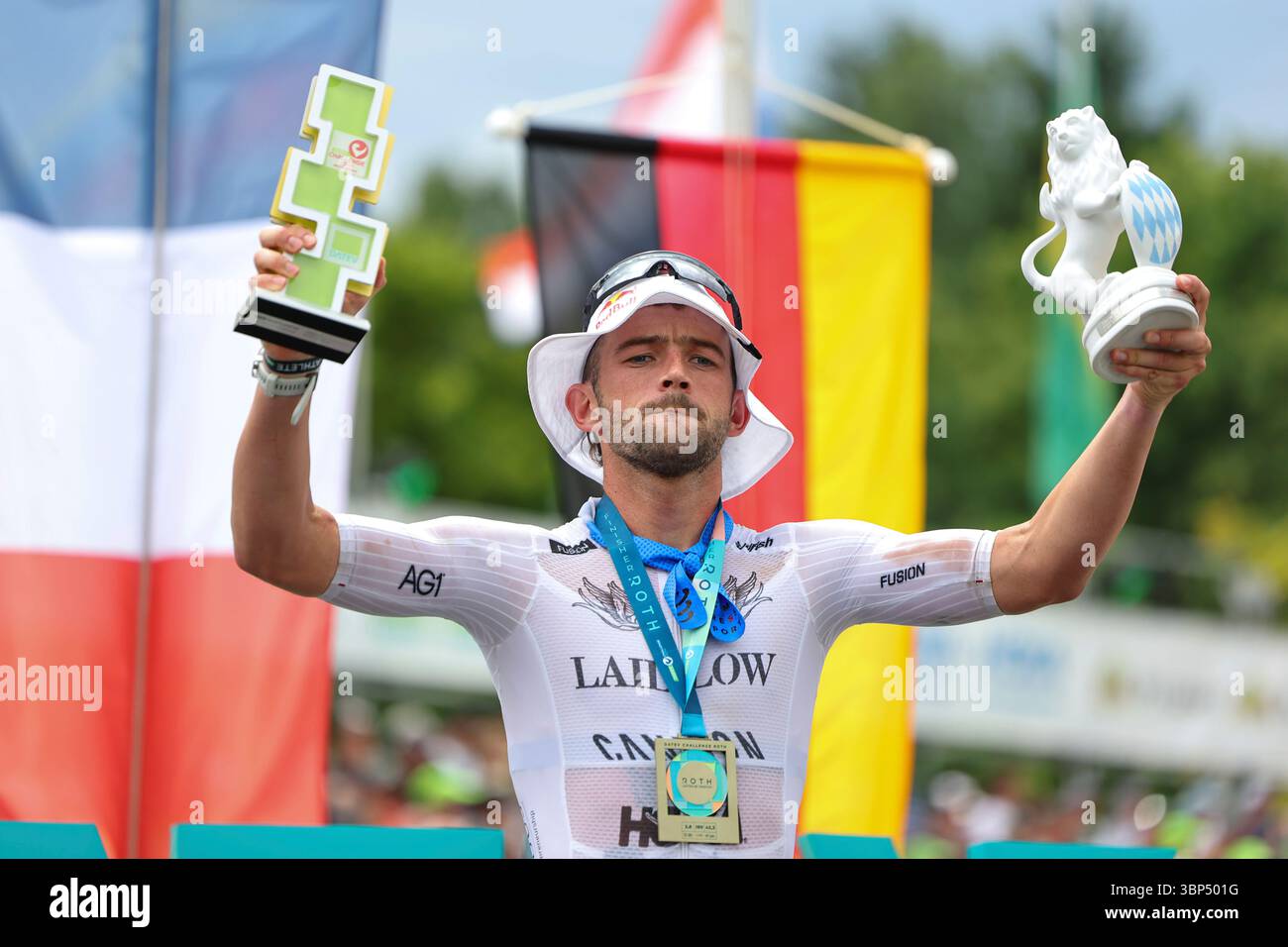 French triathlete Sam Laidlow celebrates winning the 'Roth Ironman ...