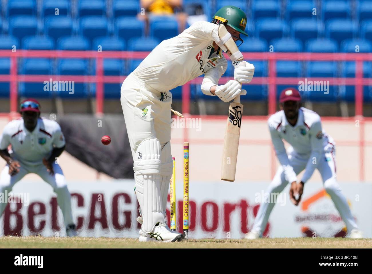 Australia's Josh Hazlewood is bowled by West Indies' Alzarri Joseph on ...