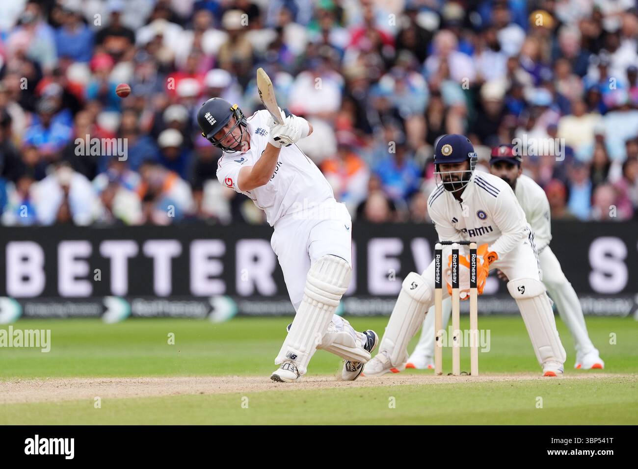 England's Jamie Smith hits a boundary for six on day five of the Second ...