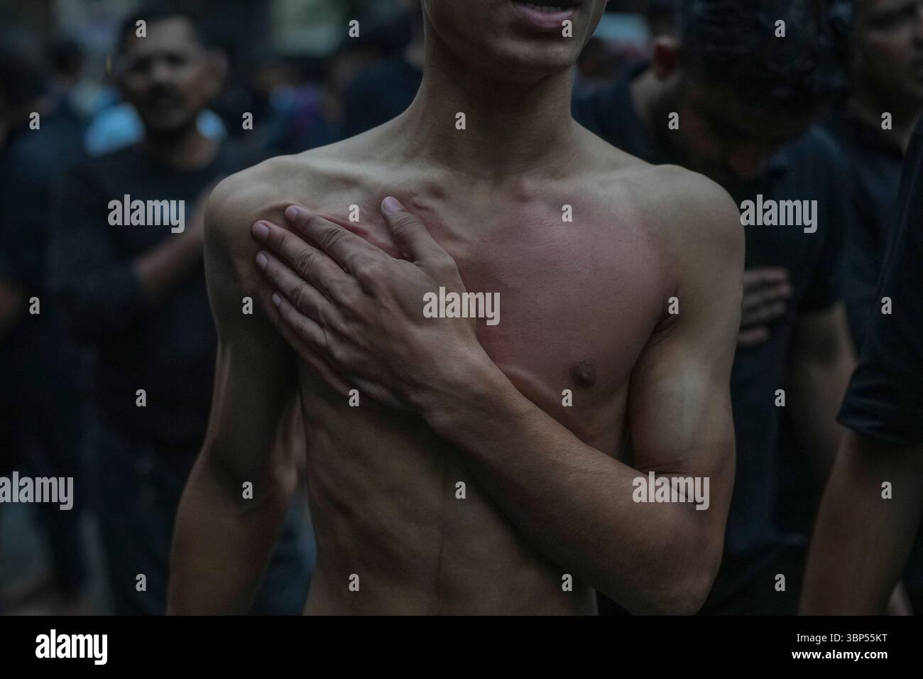 A Shiite Muslim beats his chest during an Ashoura procession marking ...