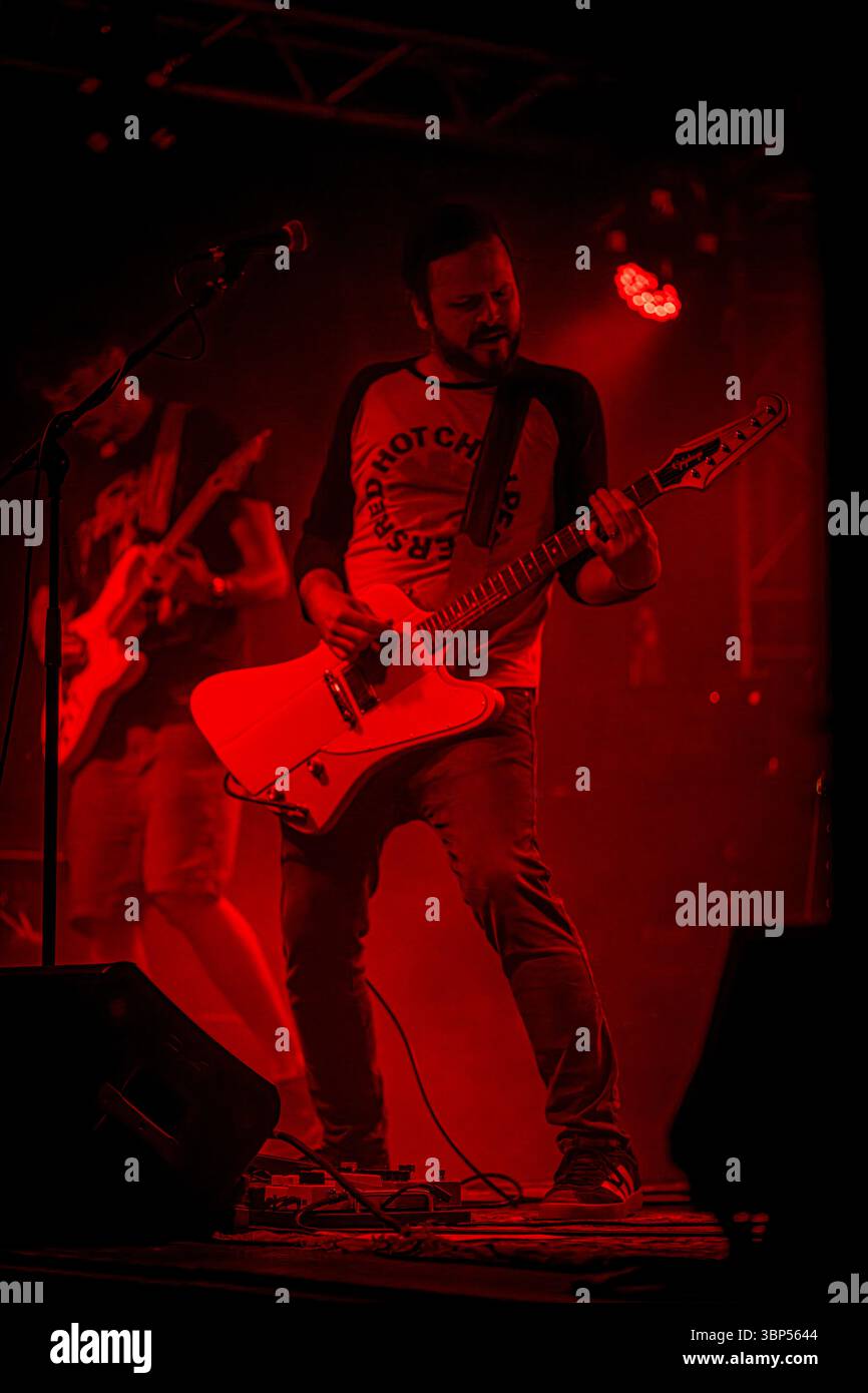 Dark red band music silhouette people concert rock color stage in ...