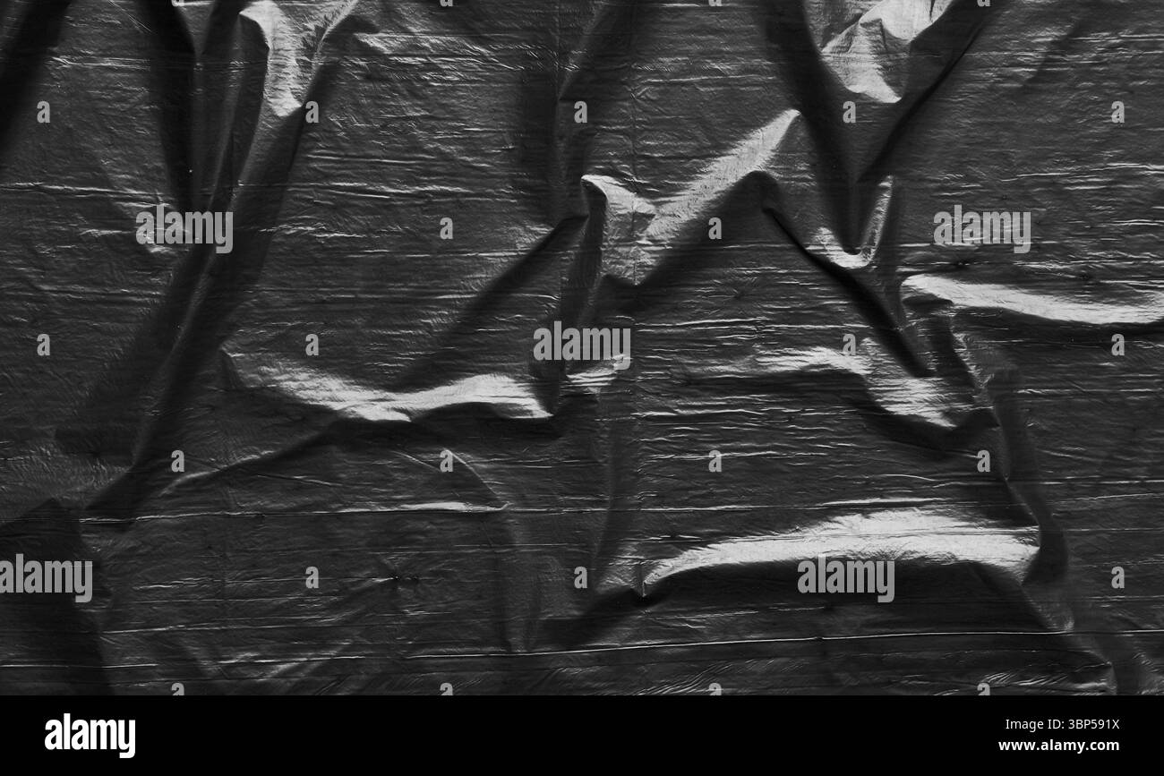Black plastic wrap texture for background Stock Photo - Alamy