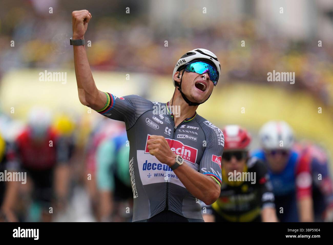 Netherlands' Mathieu van der Poel celebrates as he crosses the finish ...