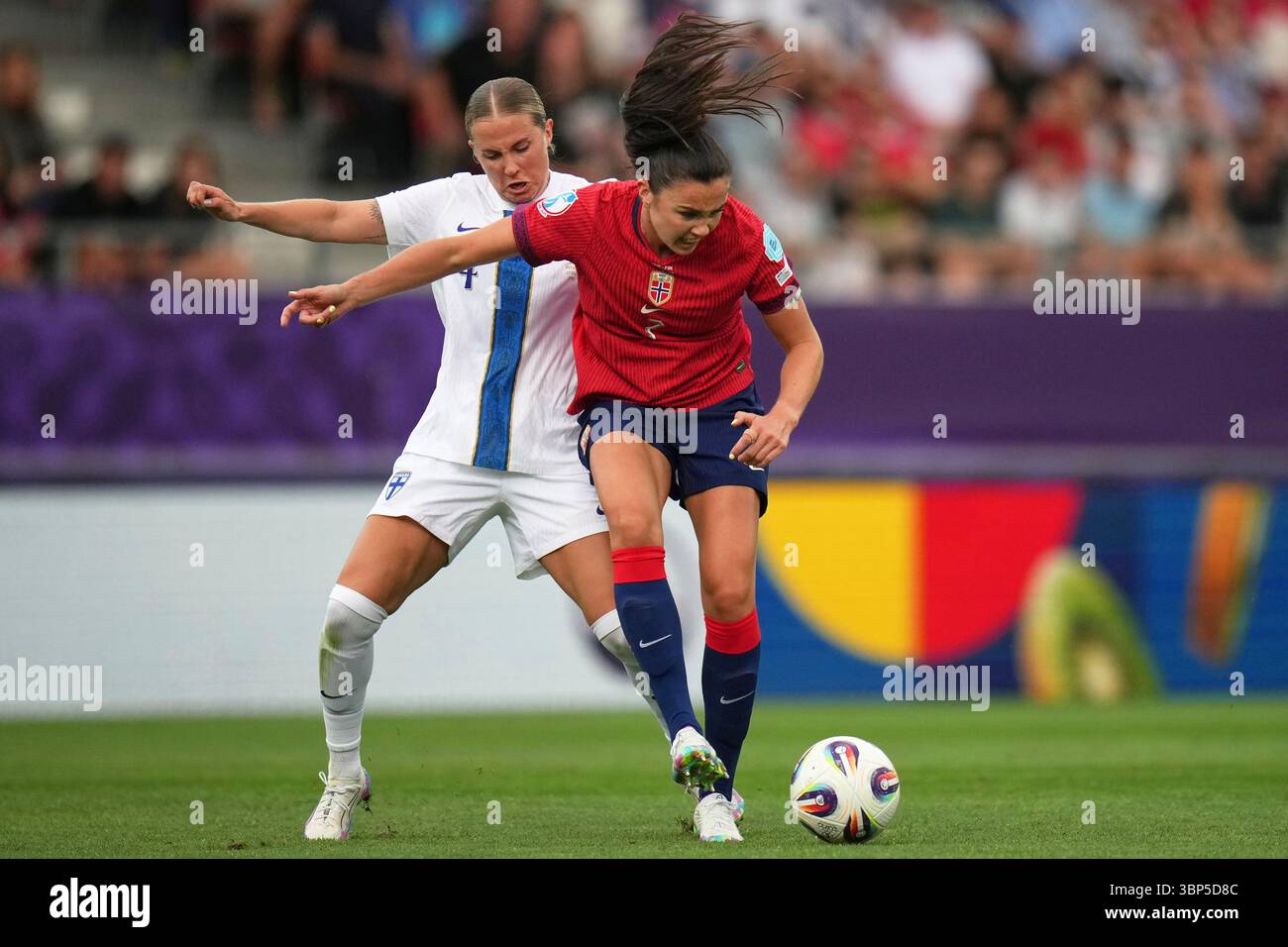Finland 's Ria Oling, left, vies for the ball with Norway's Ingrid ...