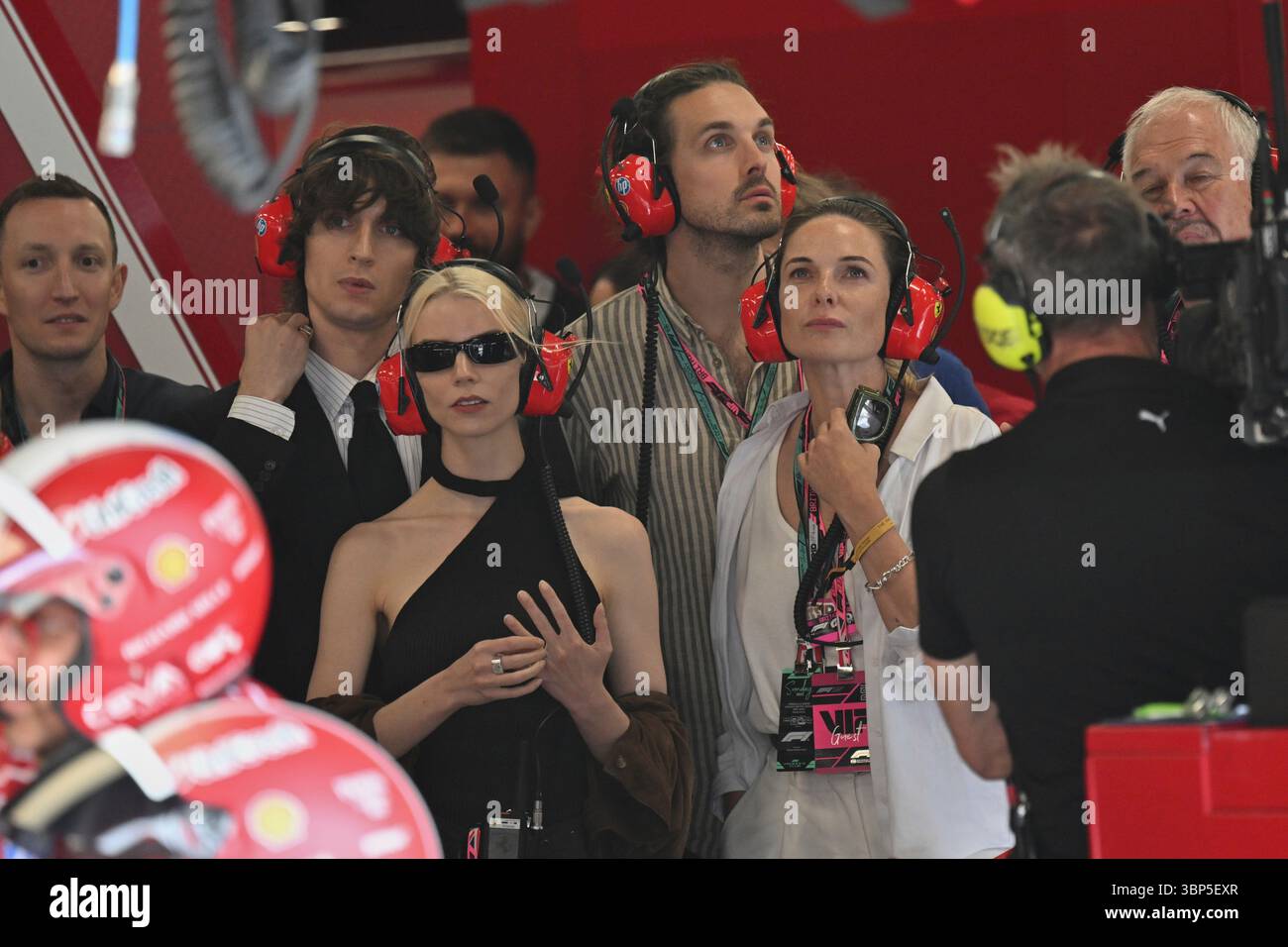 Anya Taylor-Joy, centre left, and Rebecca Ferguson, right, watch a ...