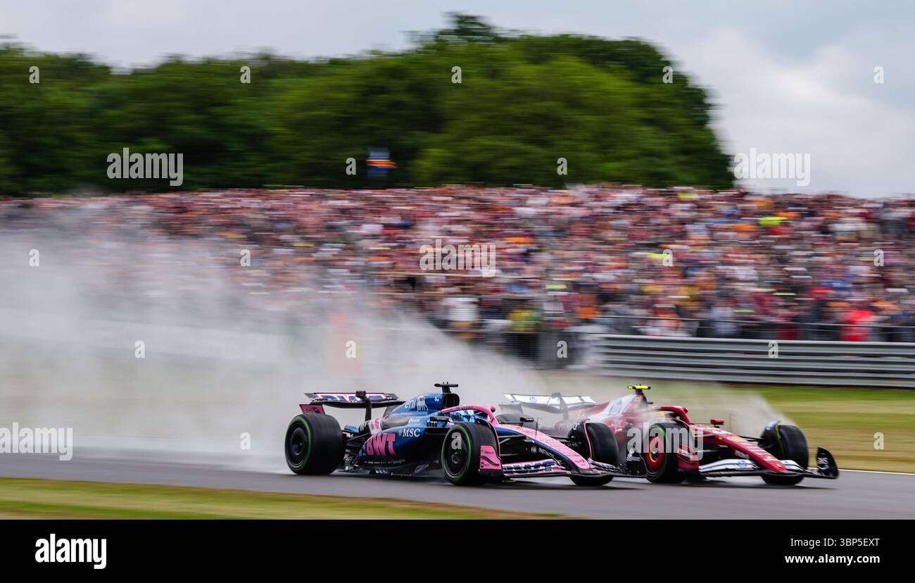 Ferrari driver Lewis Hamilton passes Alpine driver Pierre Gasly during ...