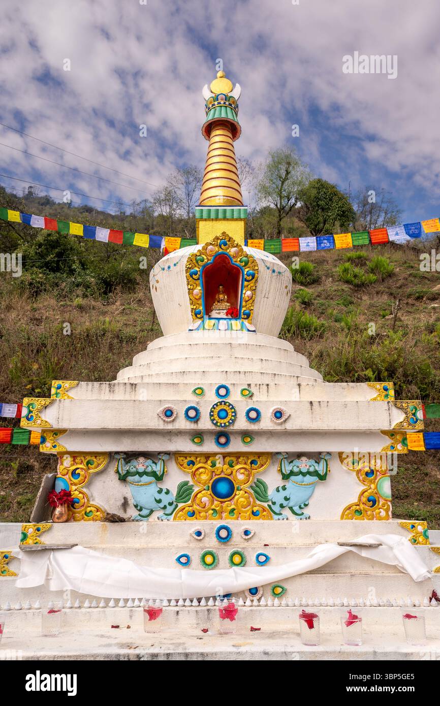 White buddhist Stupa with tradition tibetan prayer flags in Himalayan ...