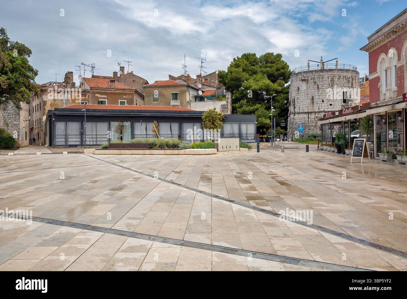 Porec, Croatia - May 21, 2025: Old town square with medieval stone ...