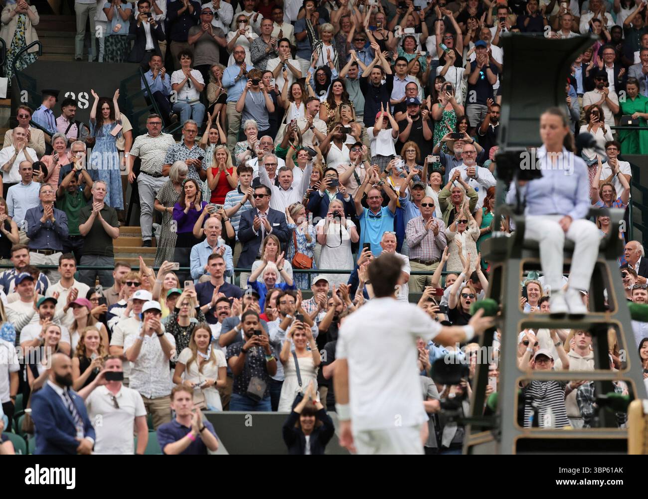 The crowd cheers for Cameron Norrie of United Kingdom after his victory ...