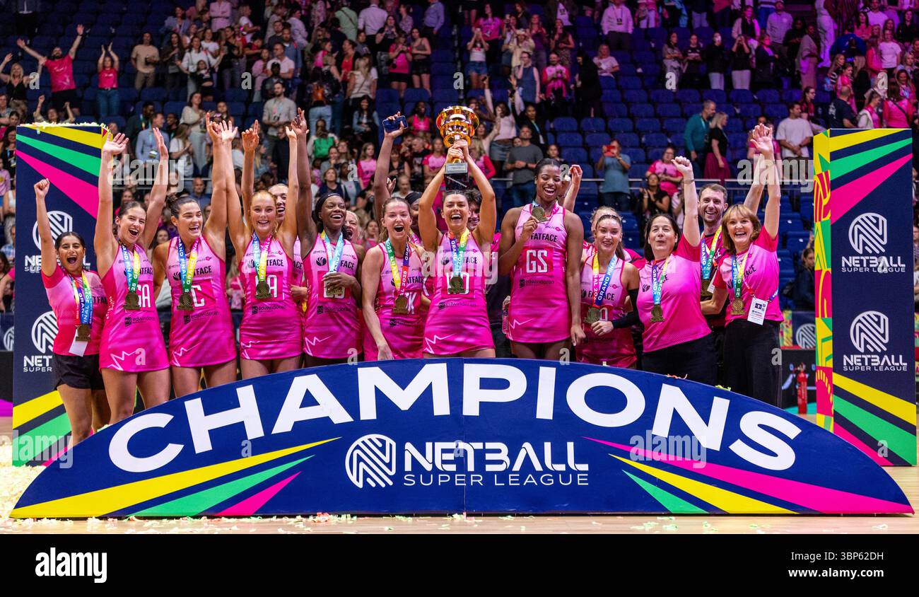 London Pulse players celebrate with the trophy after winning the ...