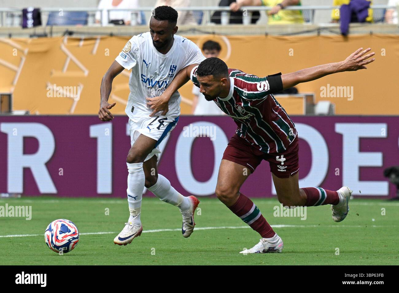 Al Hilal's Moteb Al-Harbi, left, and Fluminense's Ignacio da Silva ...