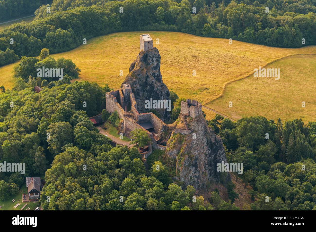 Landscape of Bohemian Paradise with Trosky Castle at summer sunrise ...