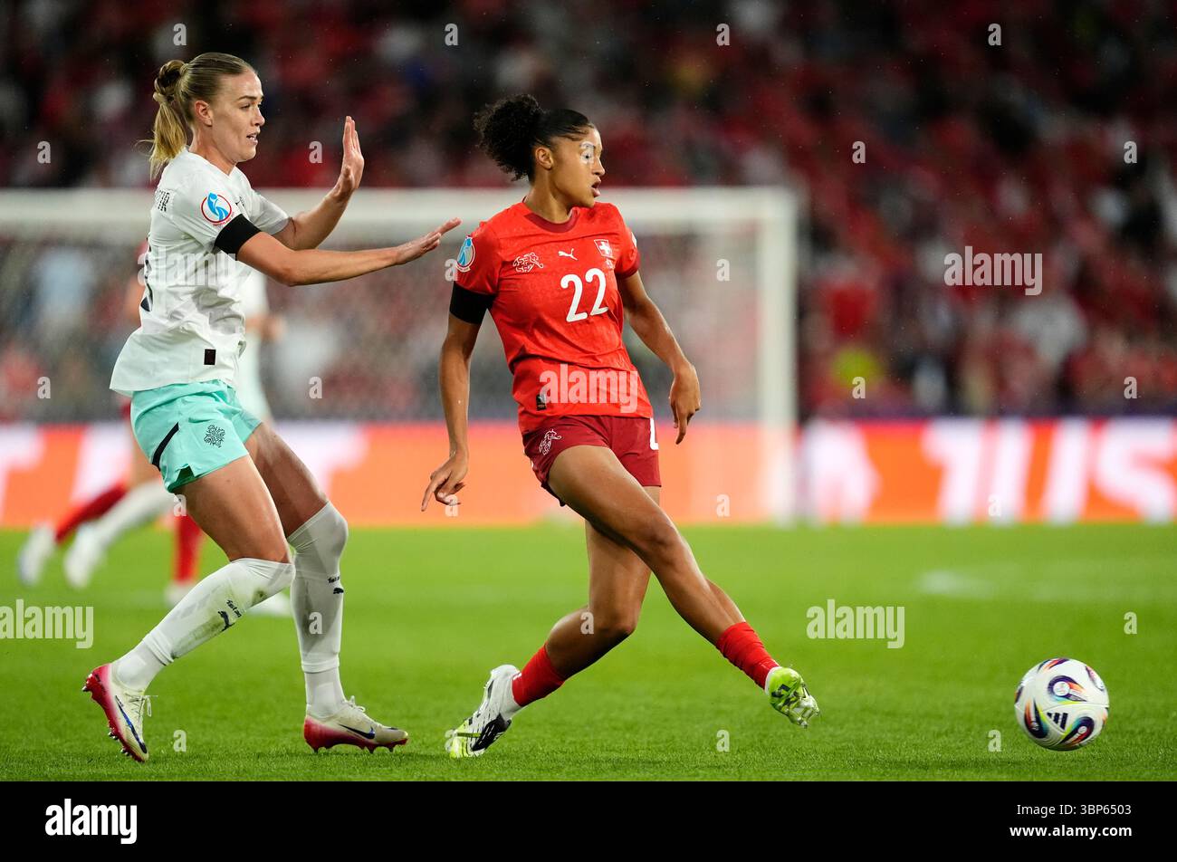 Switzerland's Sydney Schertenleib (right) passes the ball during the ...