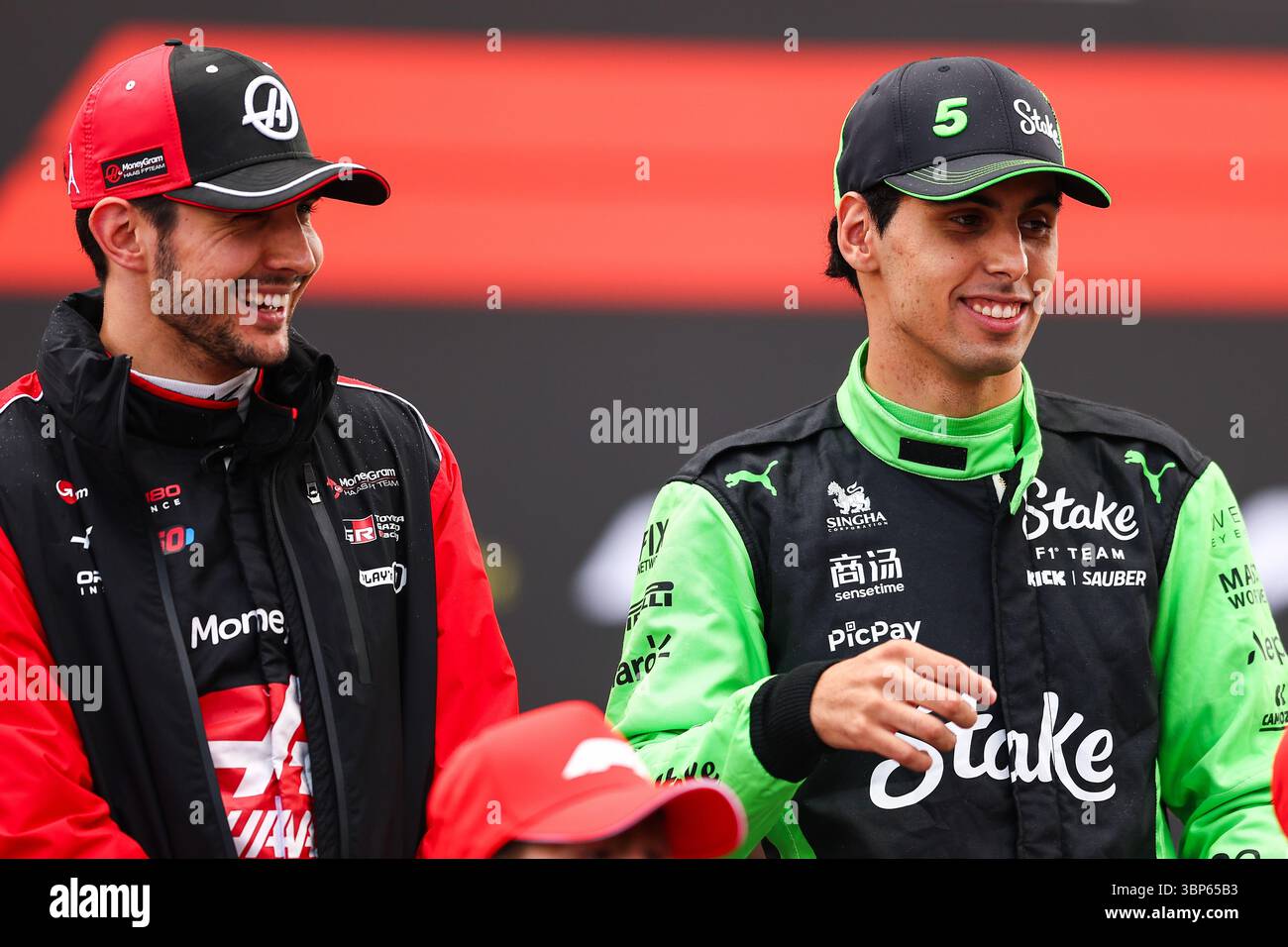 OCON Esteban (fra), Haas F1 Team VF-25, portrait and BORTOLETO Gabriel ...