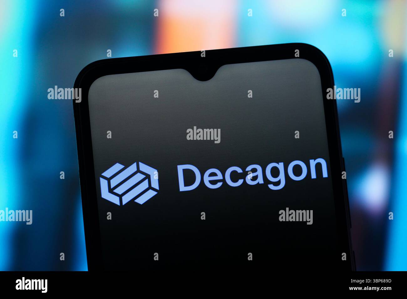 In this photo illustration, the Decagon logo is seen displayed on a ...
