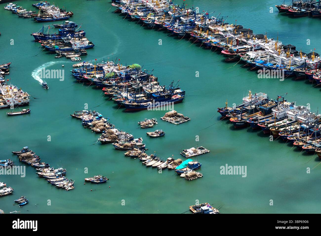 FUZHOU, CHINA - JULY 6, 2025 - Many fishing boats taking refuge from ...