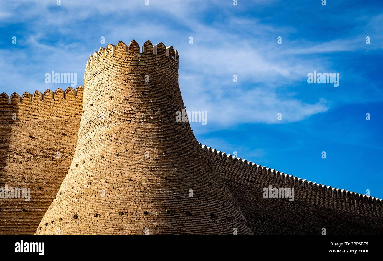 A close-up view of a historic brick fortress wall with crenellations ...