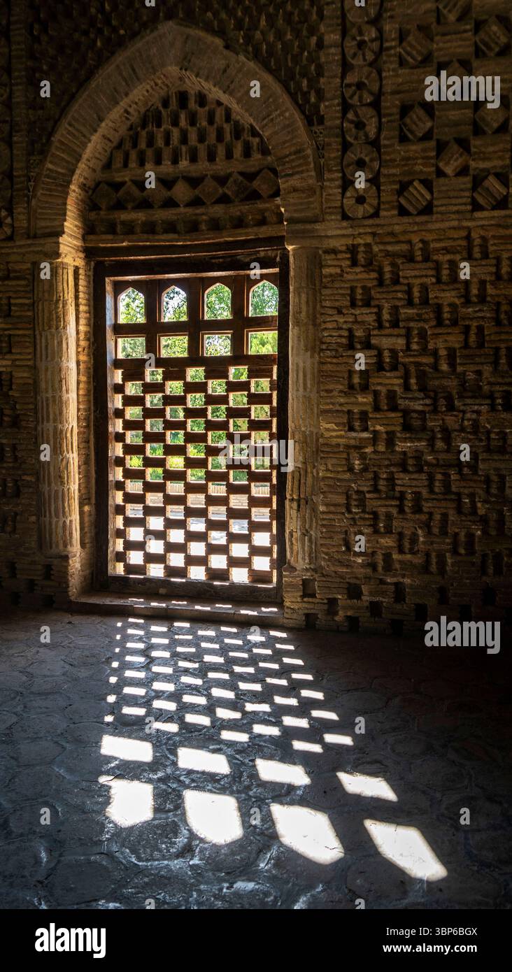 A beautifully designed wooden door with intricate patterns, casting ...