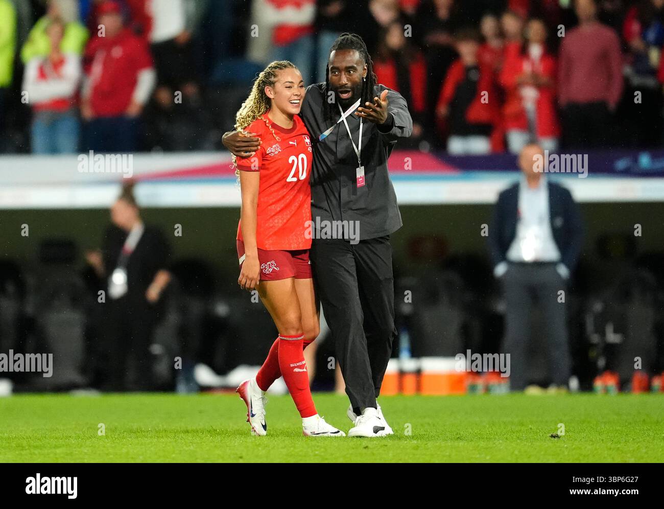 Switzerland's Alayah Pilgrim with Johan Djourou following the UEFA ...