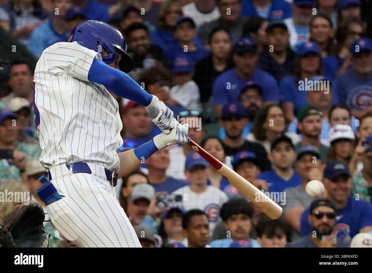 Chicago Cubs' Kyle Tucker hits a two-run single against the St. Louis ...