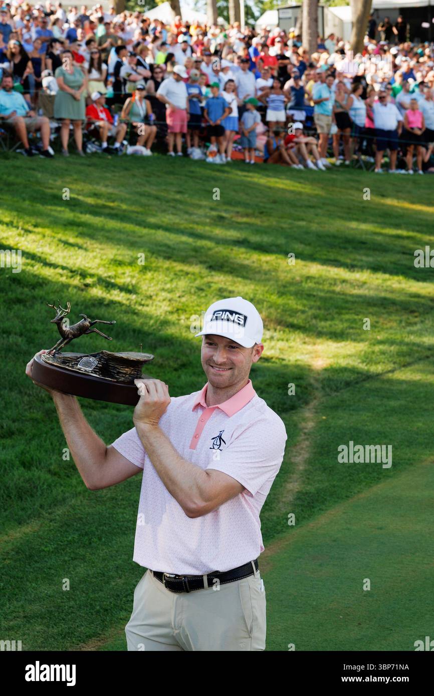 Brian Campbell poses with the John Deere Classic trophy, Sunday, July 6 ...