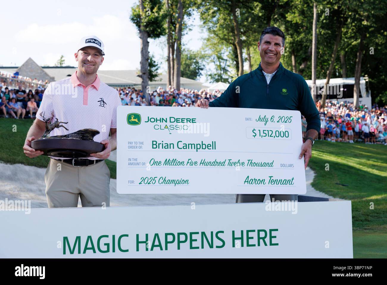 Brian Campbell is presented with the championship check by Josh Jepsen ...