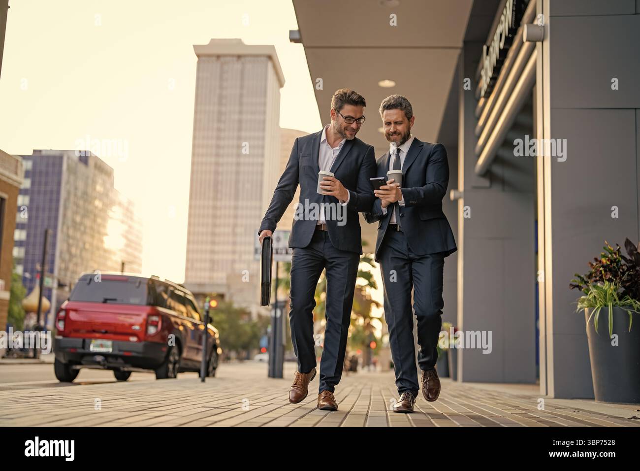 Colleague walk in New York. Success. Businessmen in suit walking ...