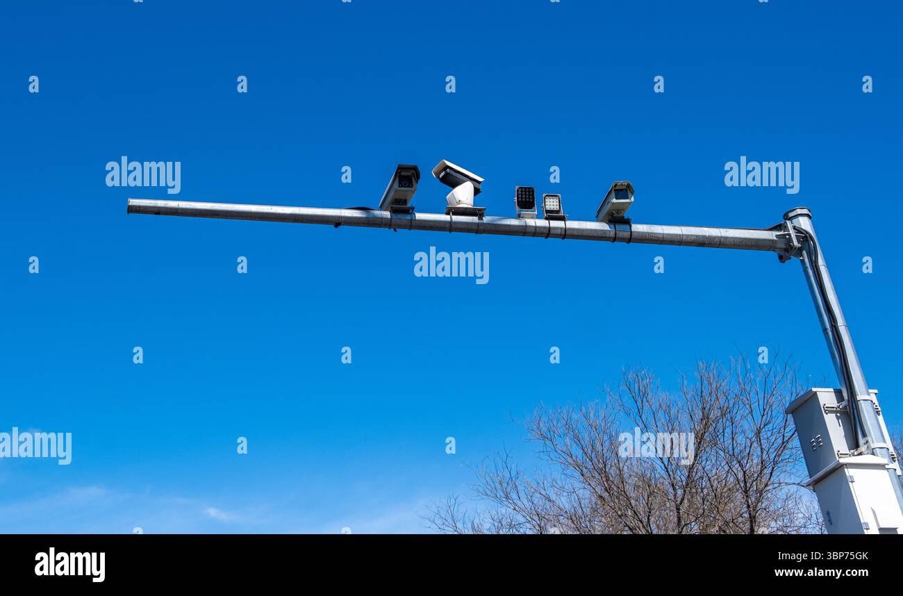 Security cameras over chinese city street, speed monitoring in China ...