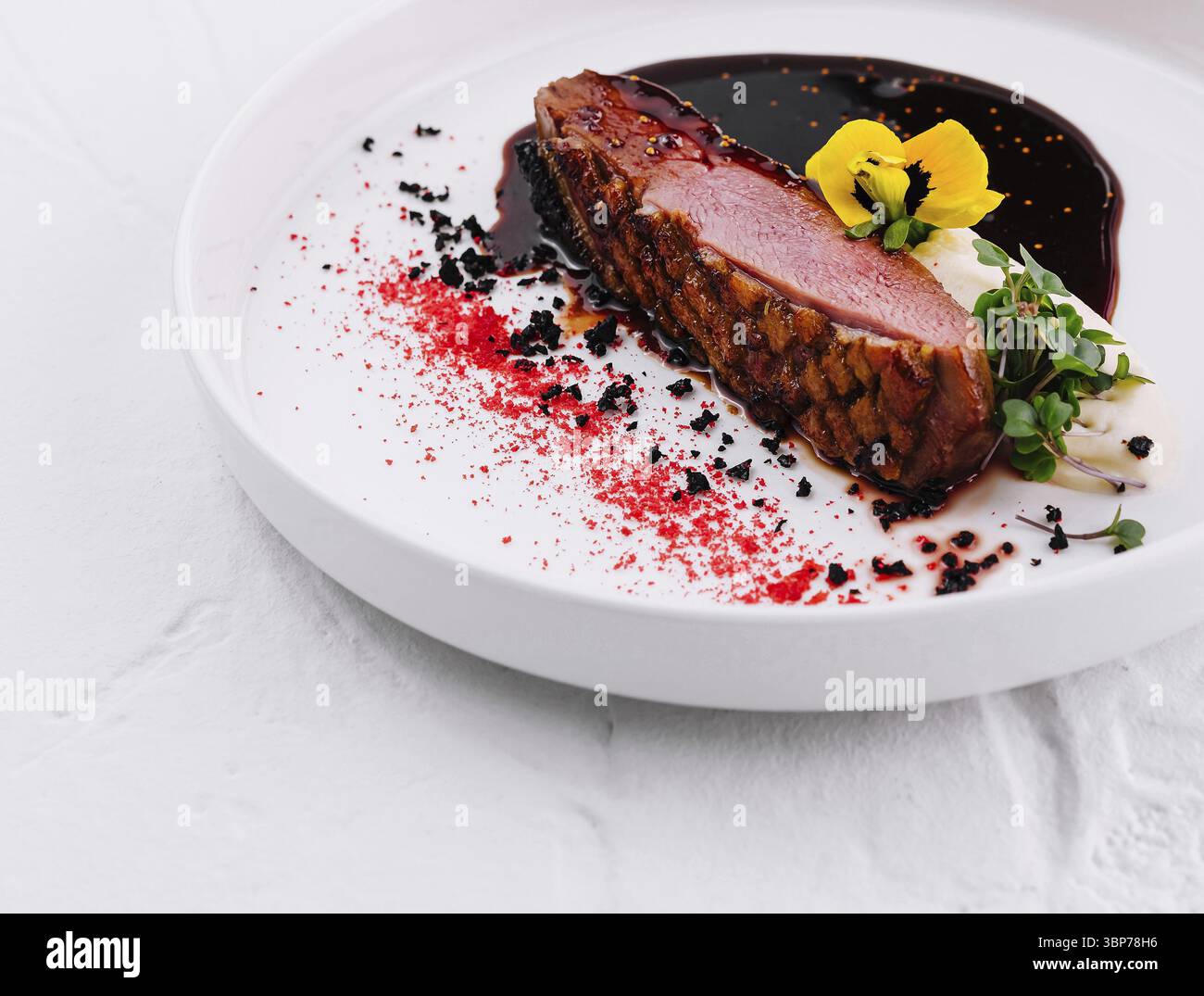 Elegant plated beef steak with a rich red wine sauce hi-res stock ...