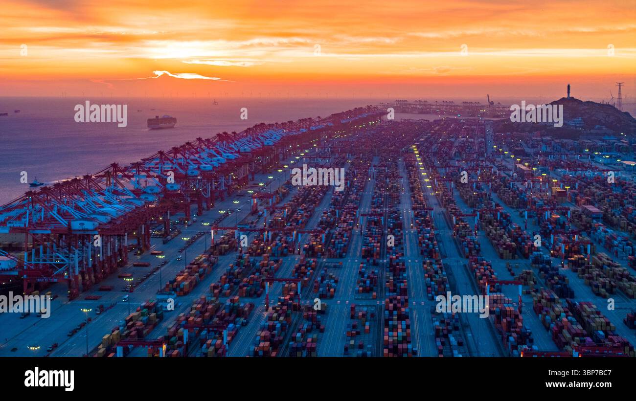 Containers piled up at the container terminal of Yangshan Deepwater ...