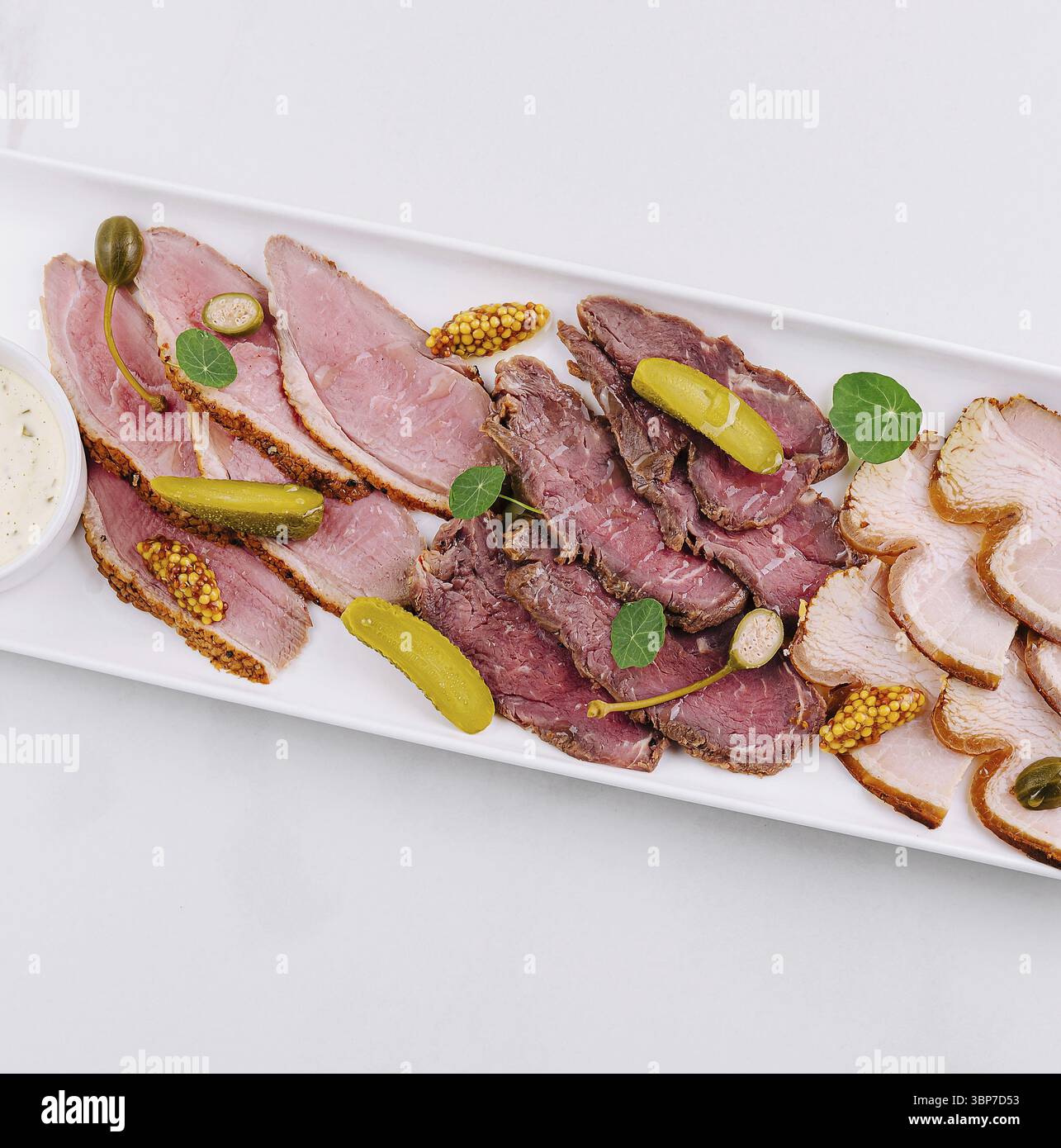 Food, Elegant serving of sliced deli meats with pickles and mustard on ...