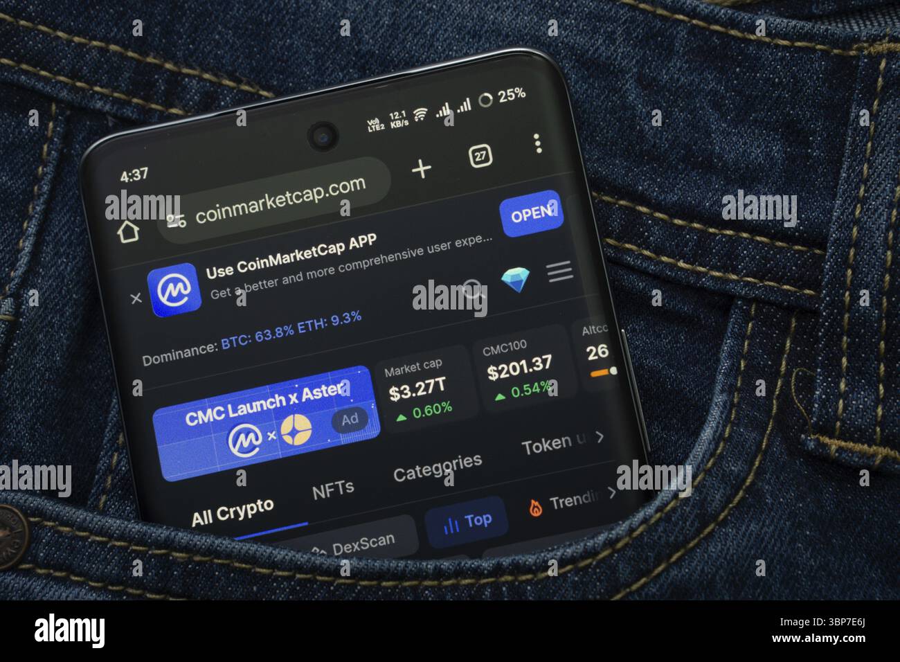 Dhaka, Bangladesh- 15 June 2025: A smartphone displaying the Coinmarketcap.com web interface ...
