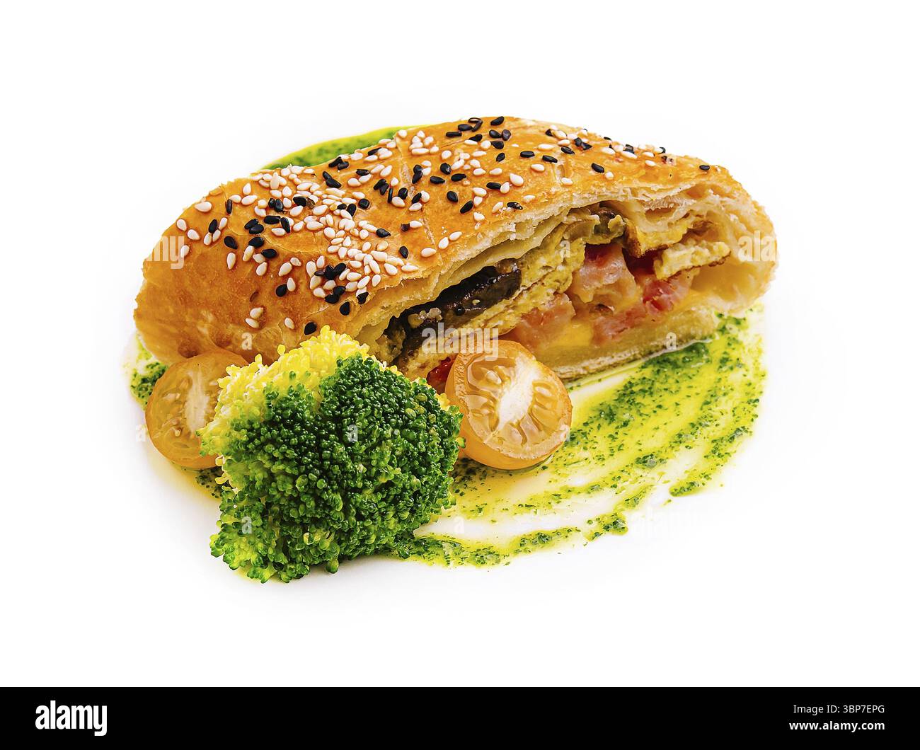 Food, A flaky pastry roll is filled with colorful vegetables, resting ...