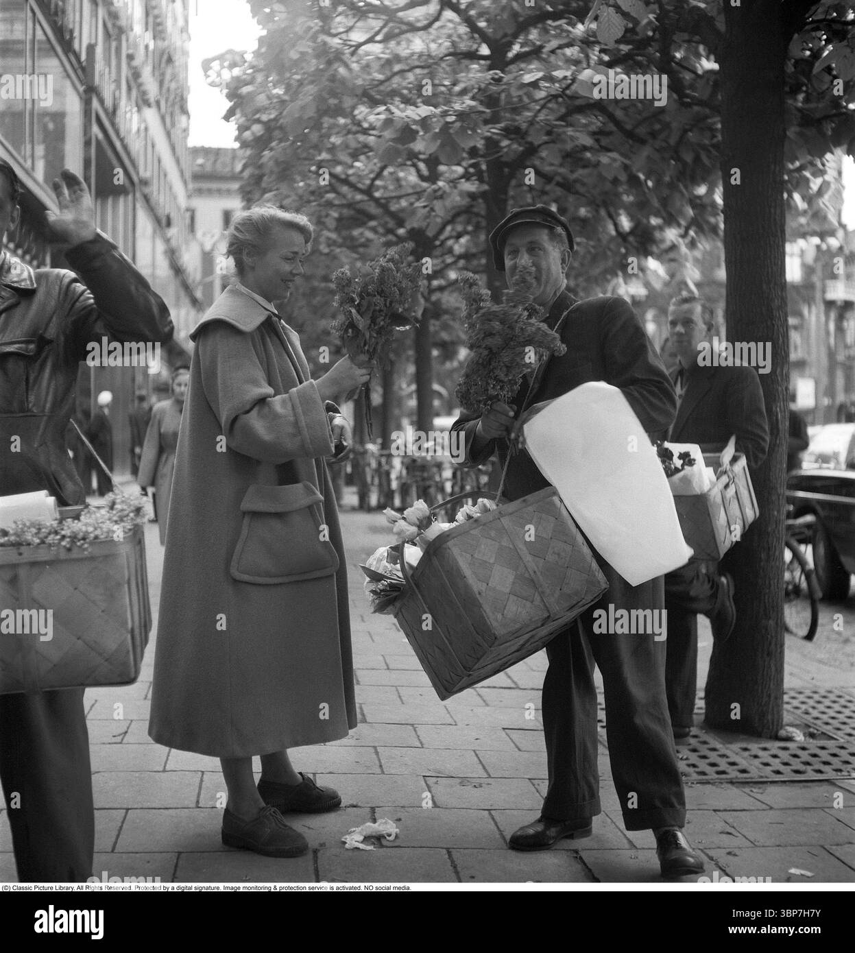 Fashionable in the 1950s. A young woman wears a typical 1950s duffel ...
