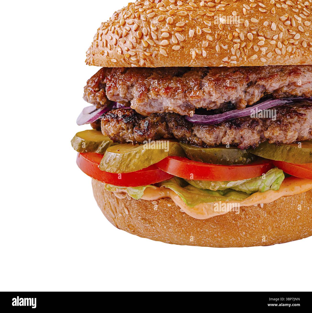 Food, A large, juicy hamburger rests on a wooden surface, showcasing ...