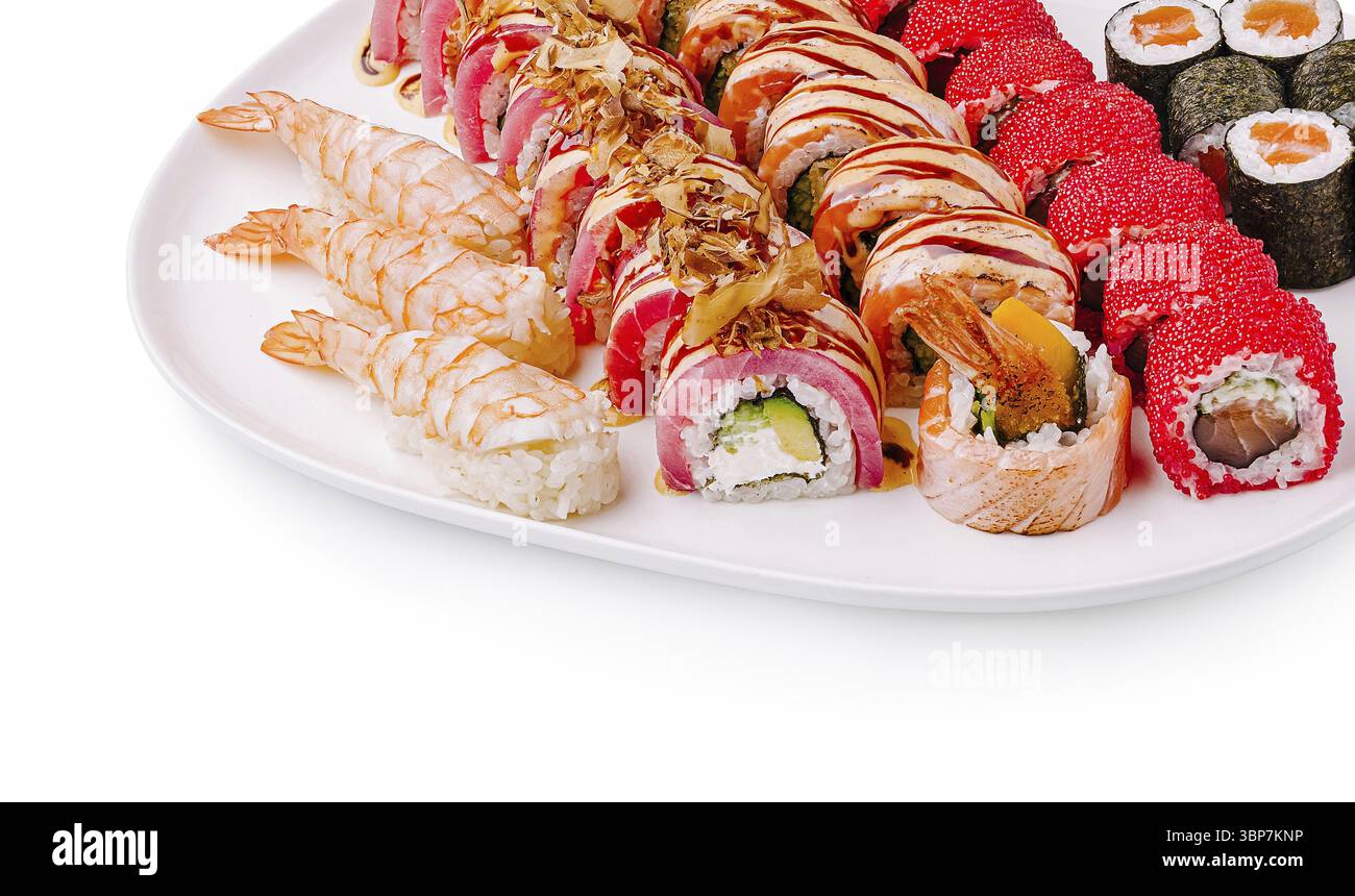 Food, A vibrant platter showcases a variety of sushi rolls including ...