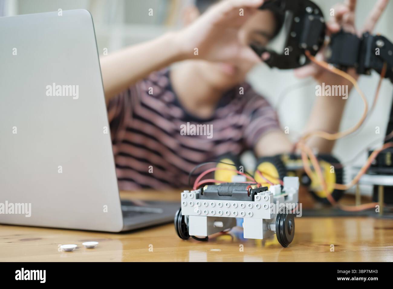 Student learning STEM education robotics for creating project studying for innovation robot ...