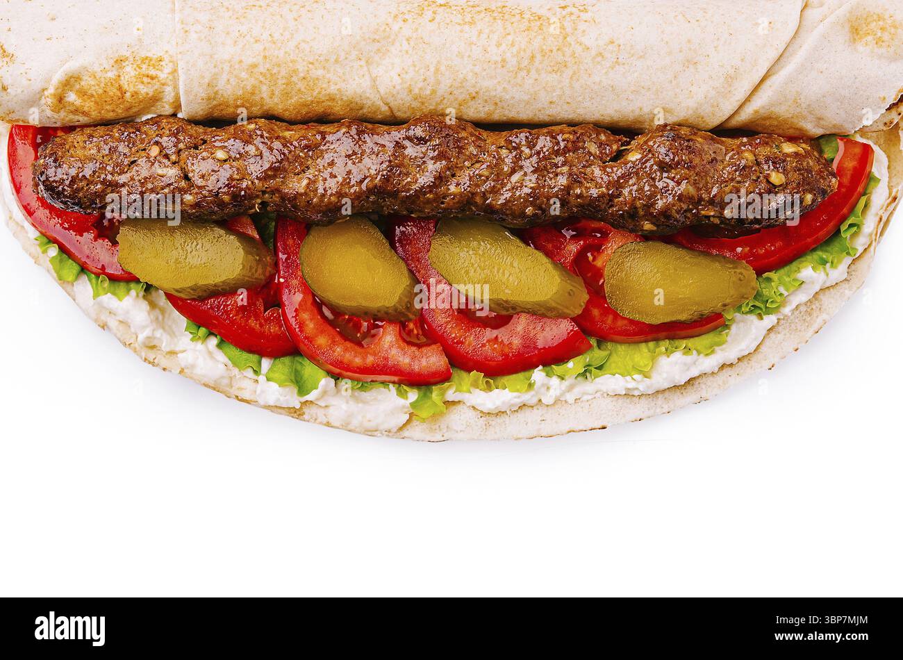 Food, A tantalizing wrap features juicy meat, fresh lettuce, sliced ...