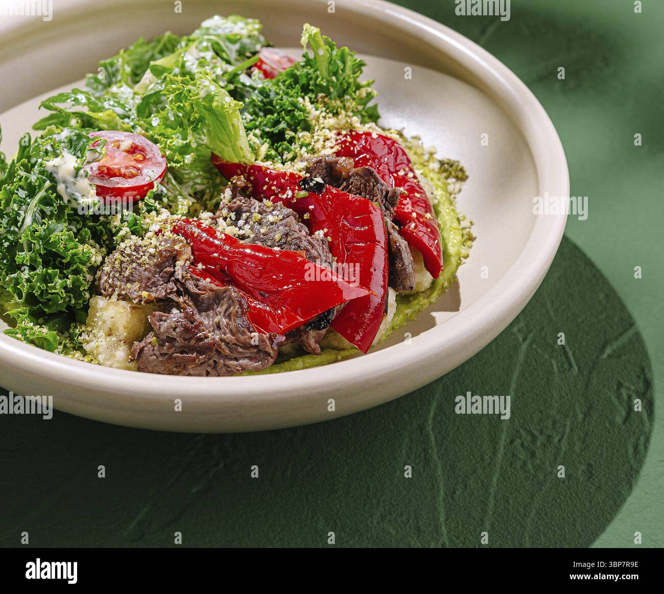 Food, A vibrant dish features tender beef slices topped with roasted ...
