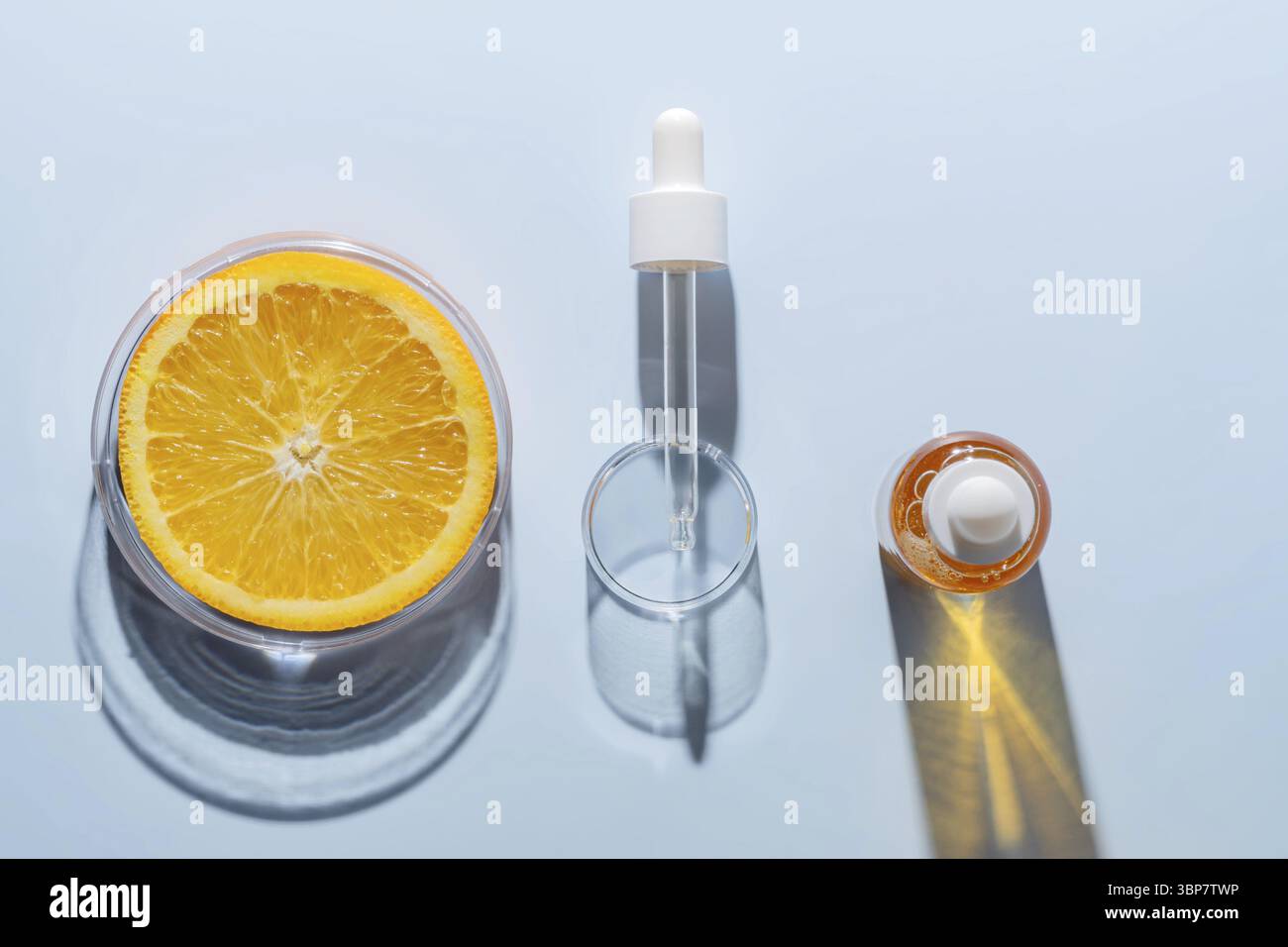 Cosmetic laboratory experiment and research with orange and ingredient for natural beauty and ...