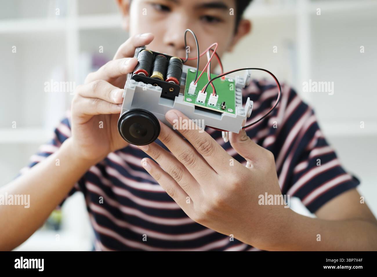 Student learning STEM education robotics for creating project studying for innovation robot ...