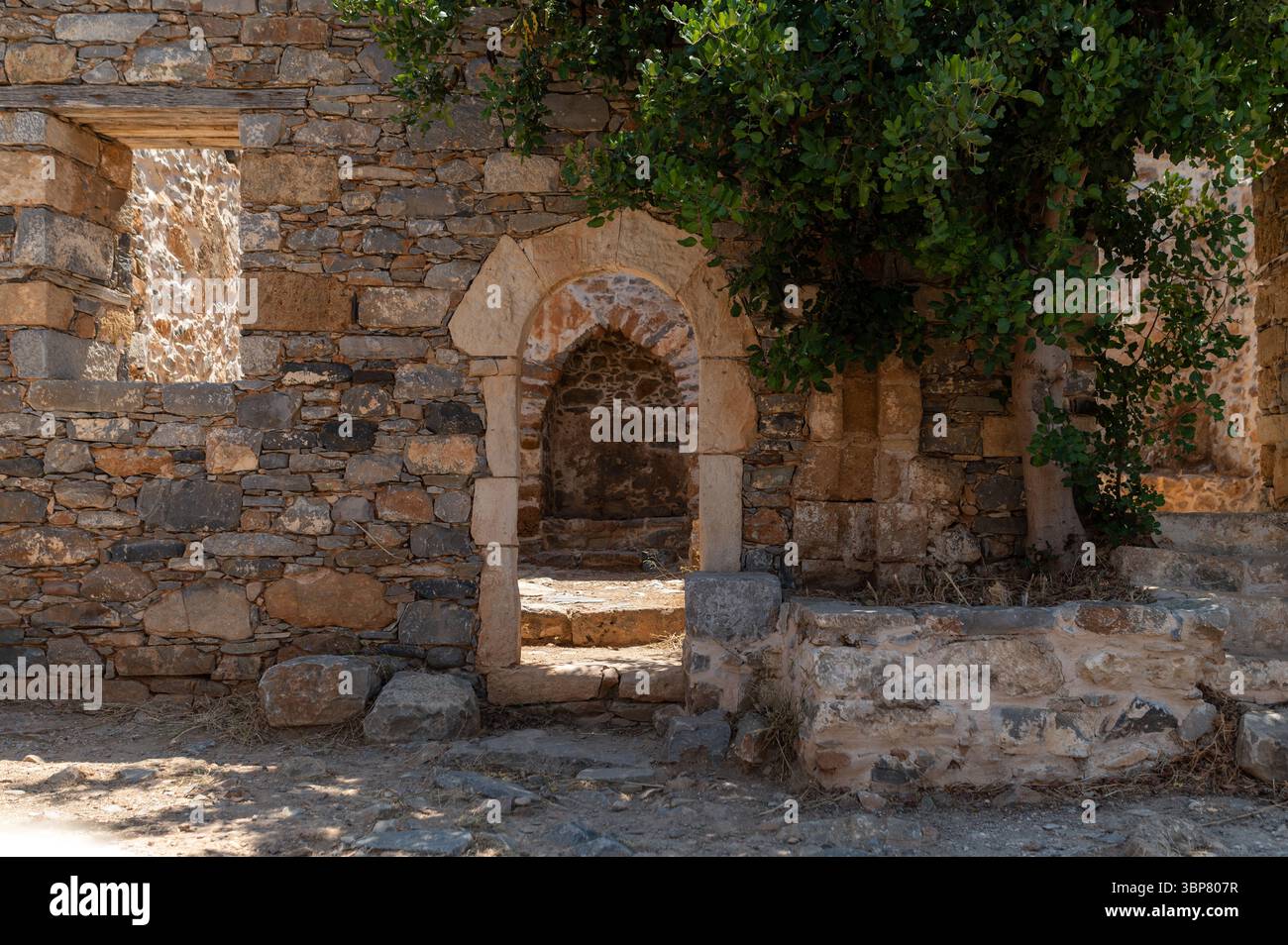 Explore the weathered stone structures and arches in the historic site ...