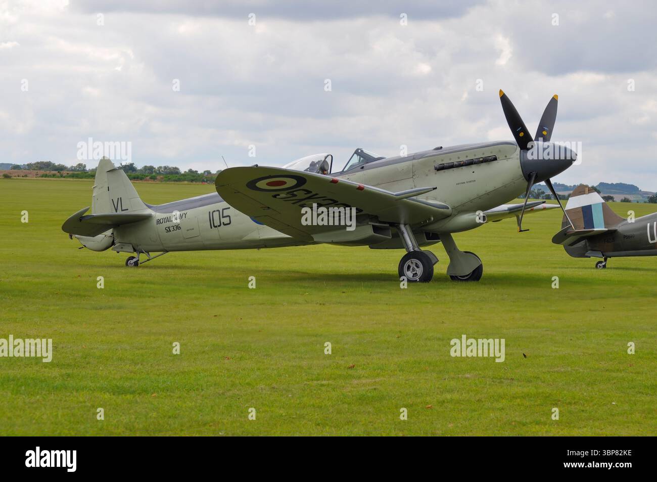 World War II Supermarine Spitfire fighter plane at the Duxford Airshow, England. Warbirds and ...