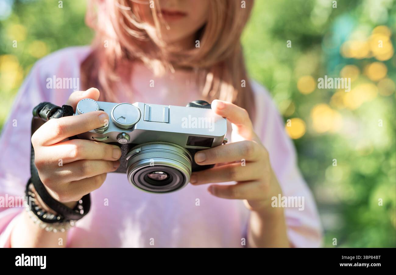 Close up female photographer setting hi-res stock photography and ...