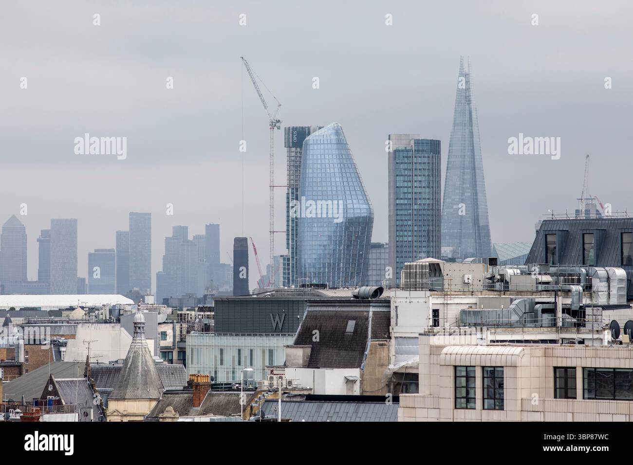 The iconic skyline of the capital city of the UK , London viewed from a roof top in Soho Stock ...