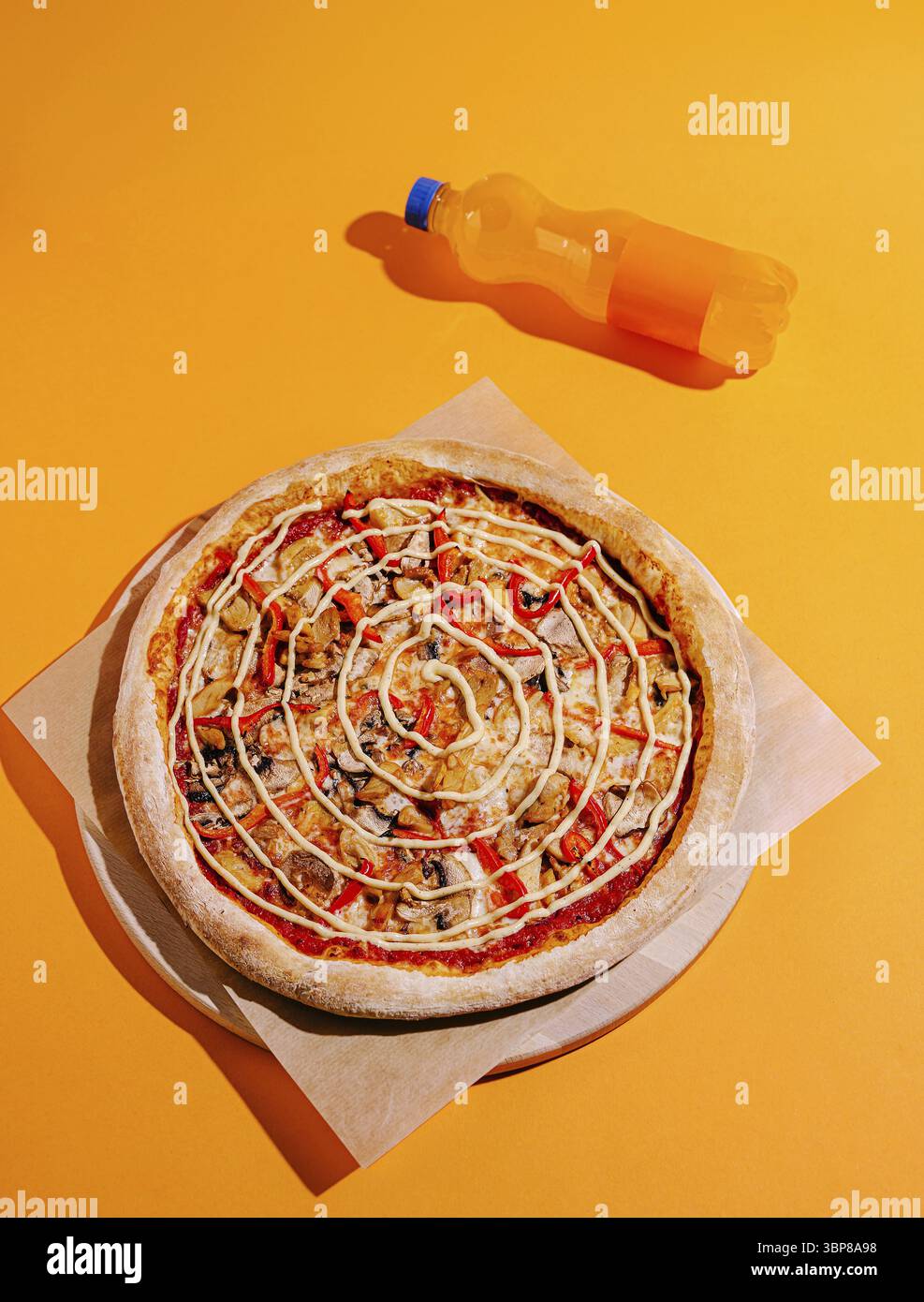Food, A fresh pizza sits on a circular wooden tray, topped with ...